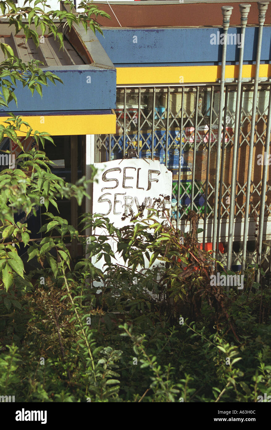 self service sign by shop petrol station Stock Photo - Alamy