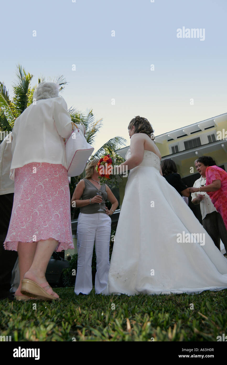 Talking to guests hi-res stock photography and images - Alamy