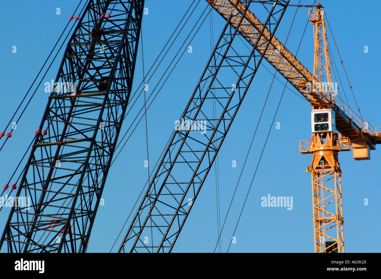 cranes construction equipment uplifting height tall towering big Stock ...