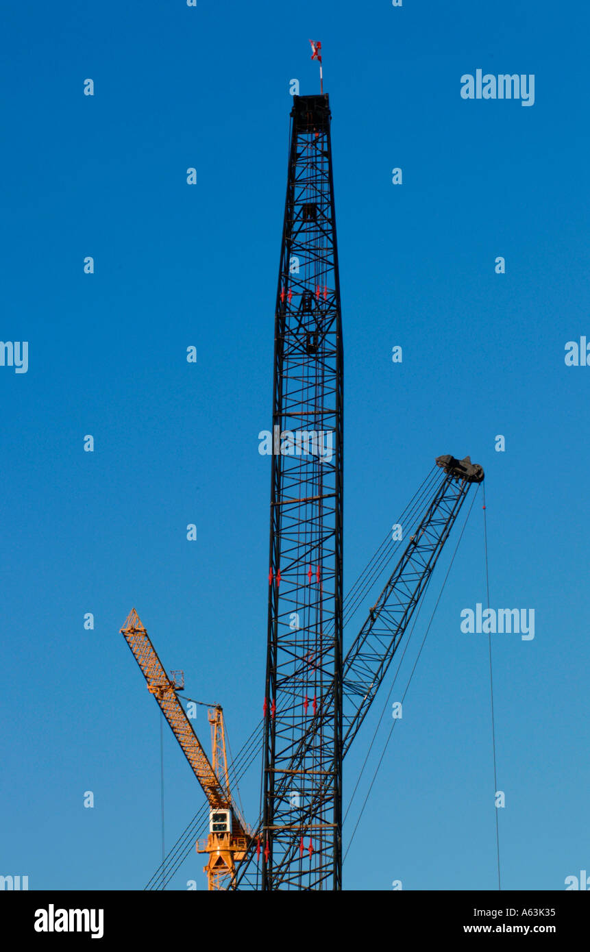 cranes construction equipment uplifting height tall towering big Stock ...