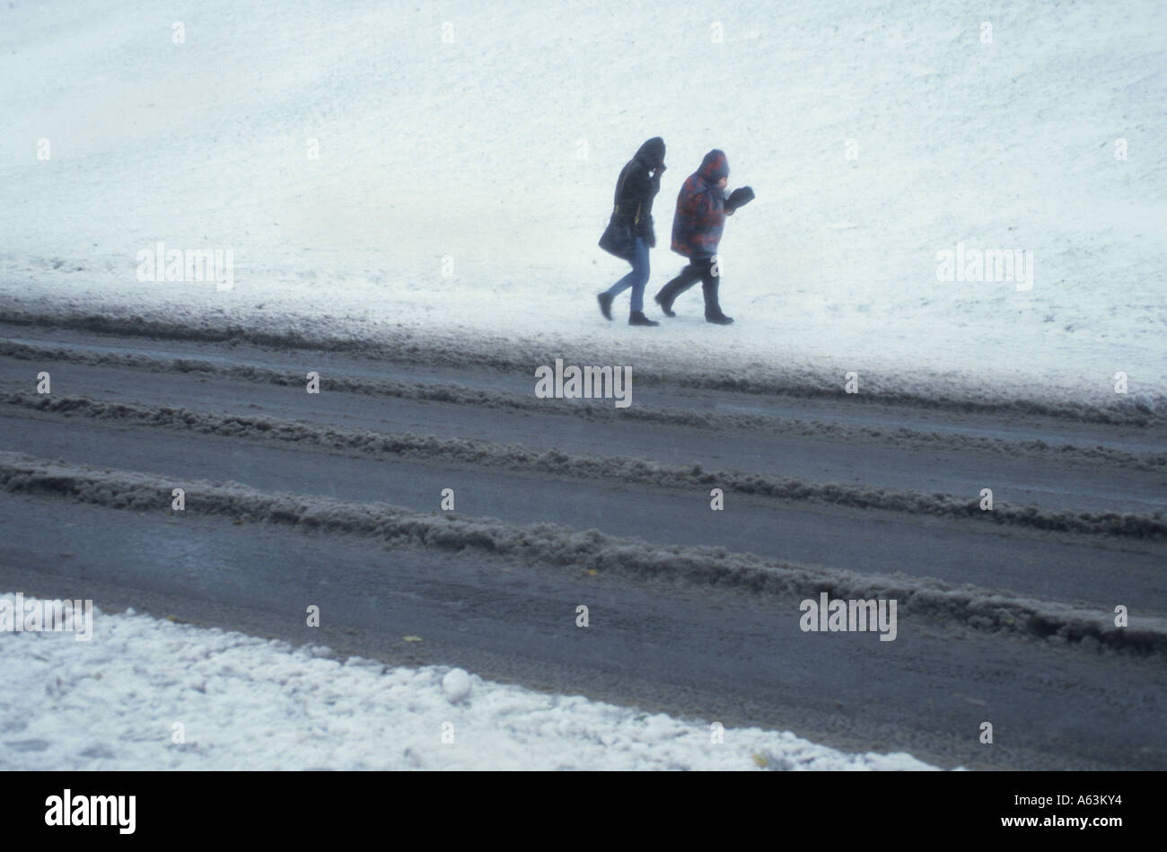 Walking Through Snow Storm Stock Photo - Alamy