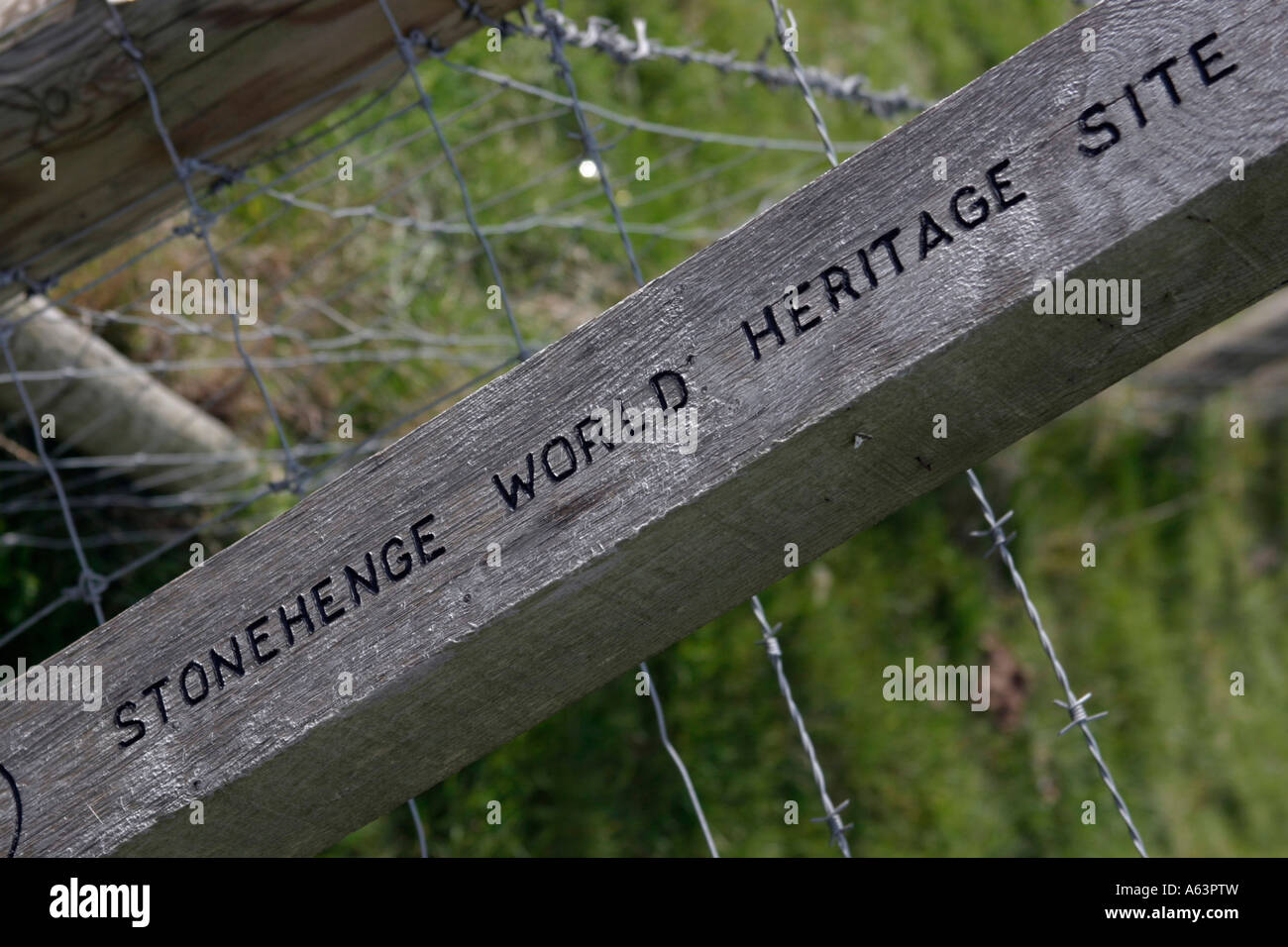 fence post proclaiming Stonehenges status as a world heritage site ...