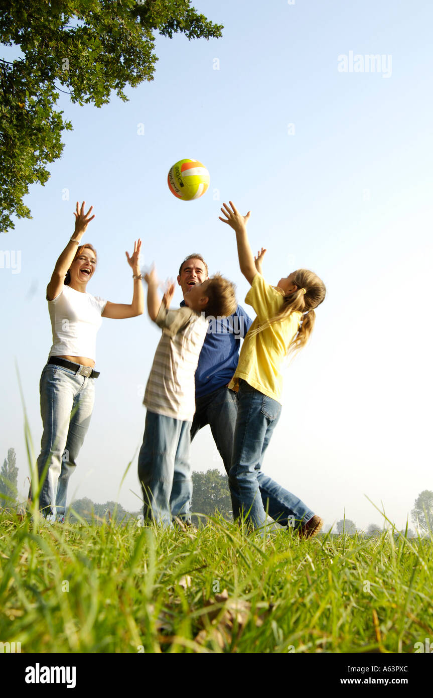 Family fun mother father children balls hi-res stock photography and ...