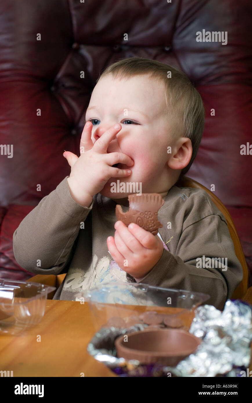 2 year old boy eating at home Stock Photo - Alamy
