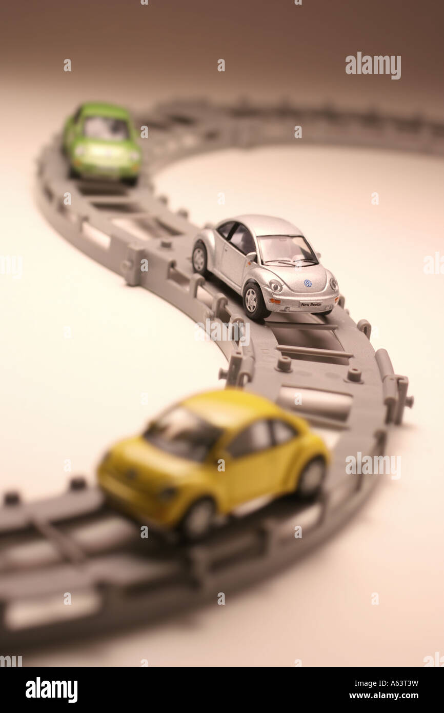 Miniature Cars on Railway Track Stock Photo - Alamy