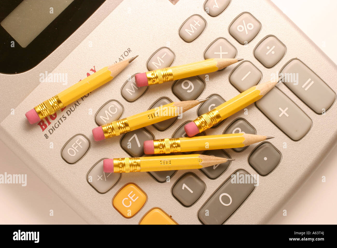 Short Pencils on Calculator Stock Photo - Alamy