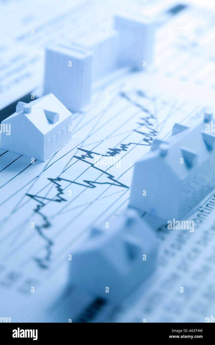Building Models on Financial Newspaper Stock Photo - Alamy