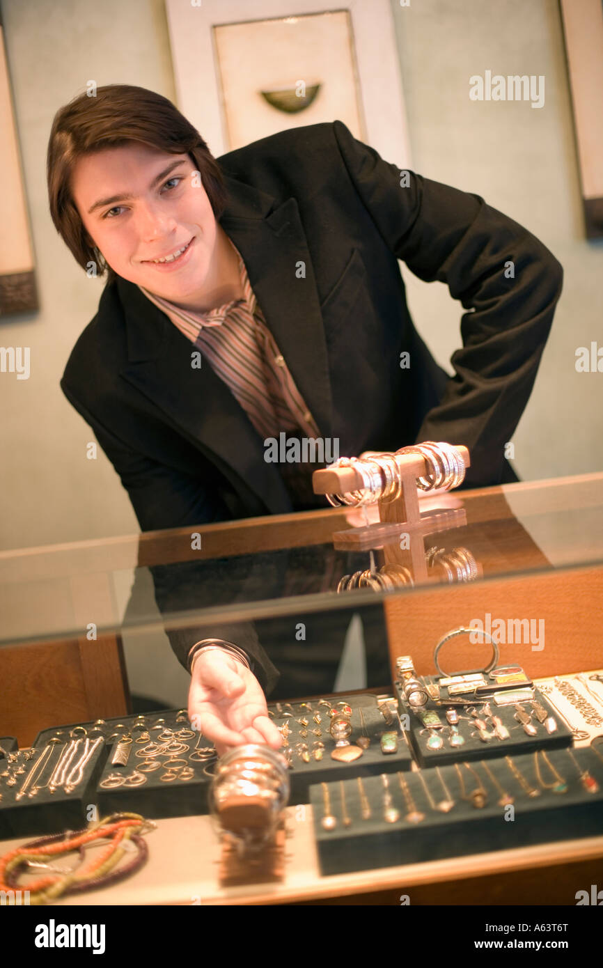 Sales man helping customer in store hi-res stock photography and images ...