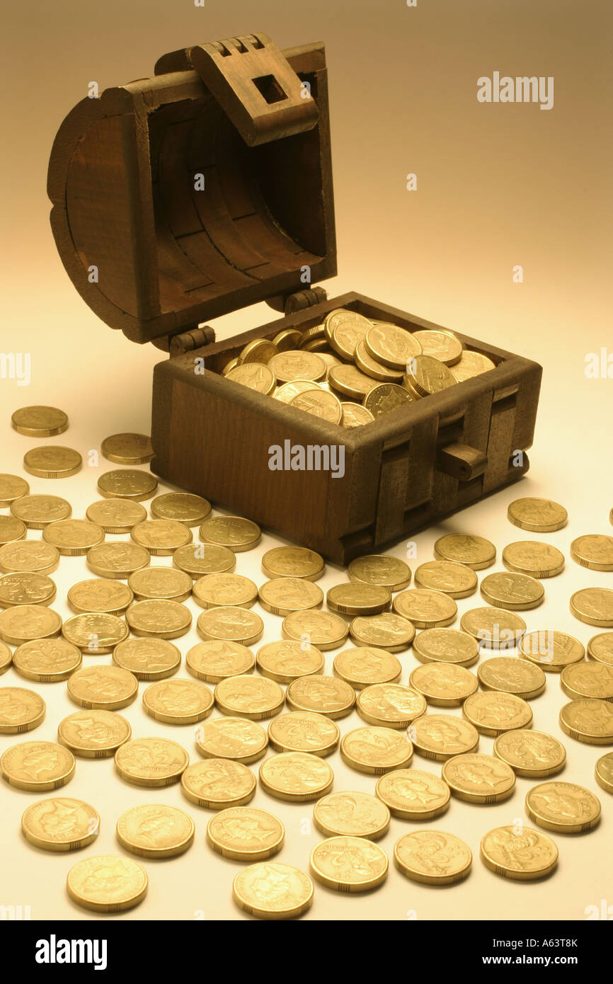 Wooden Chest with Coins Stock Photo - Alamy