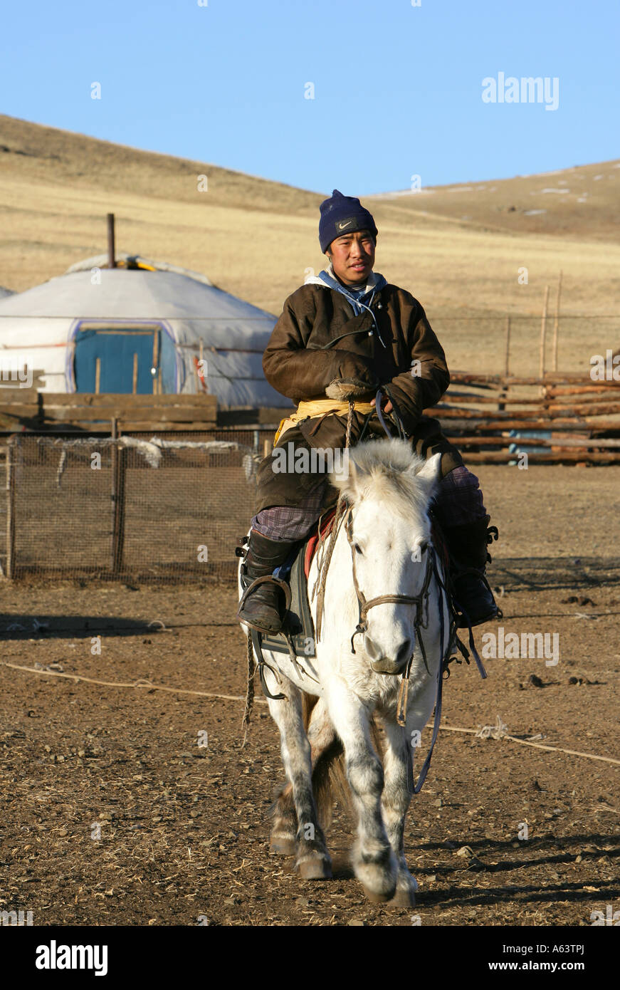 Mongolia, Nomad with his horse in the desert at Zuunmod Stock Photo - Alamy