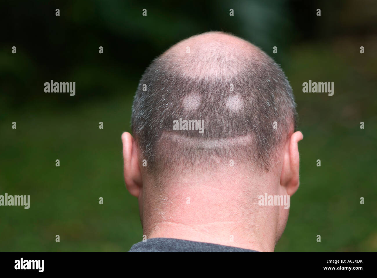 Smiley head H Stock Photo - Alamy
