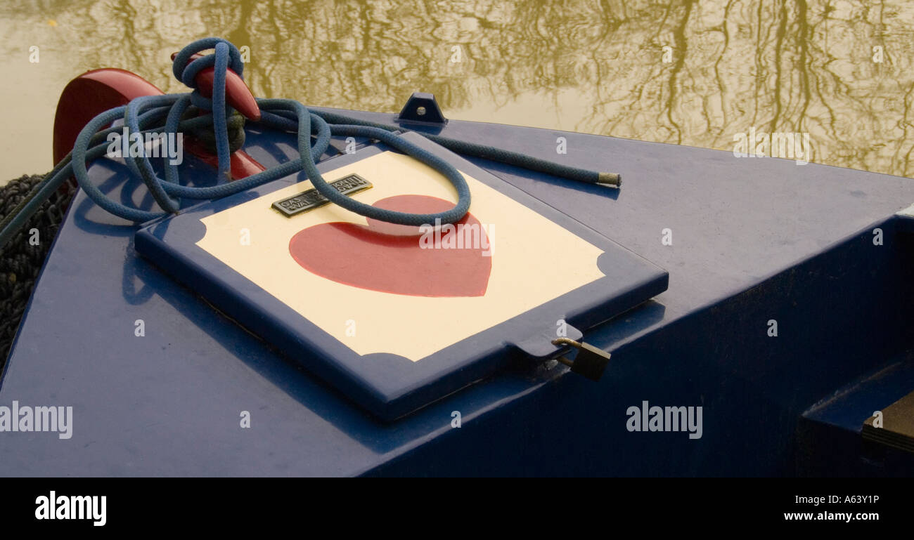 The colourful heart markings of a Narrowboat Bow Stock Photo - Alamy