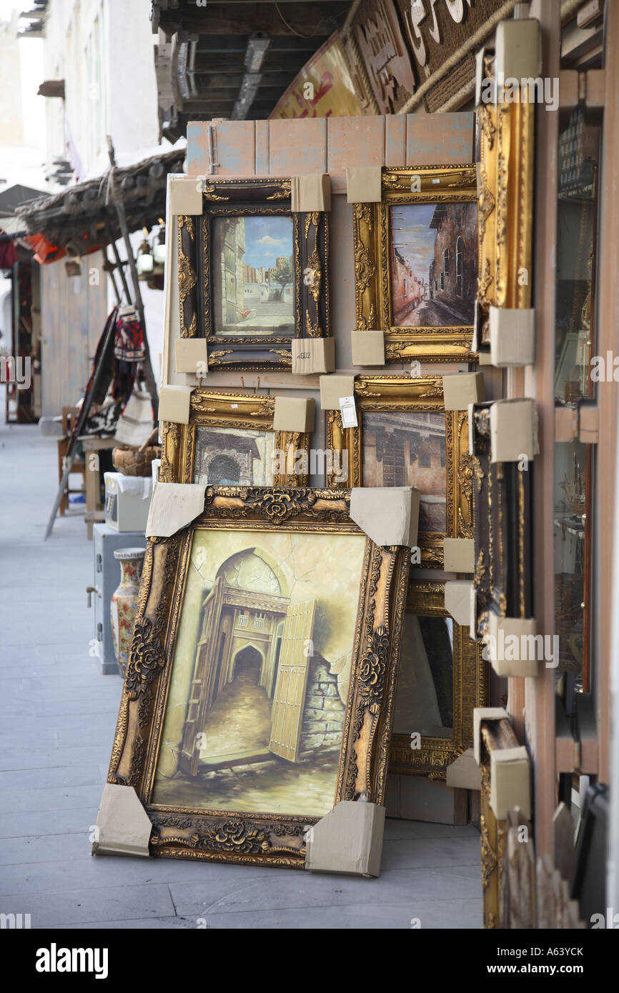 Shop in the Souqs of Doha Qatar selling pictures Stock Photo - Alamy