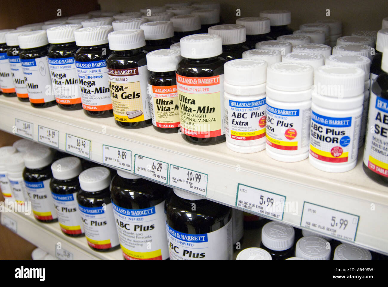 Rows of vitamin supplements in Holland & Barrett shop, UK Stock Photo ...