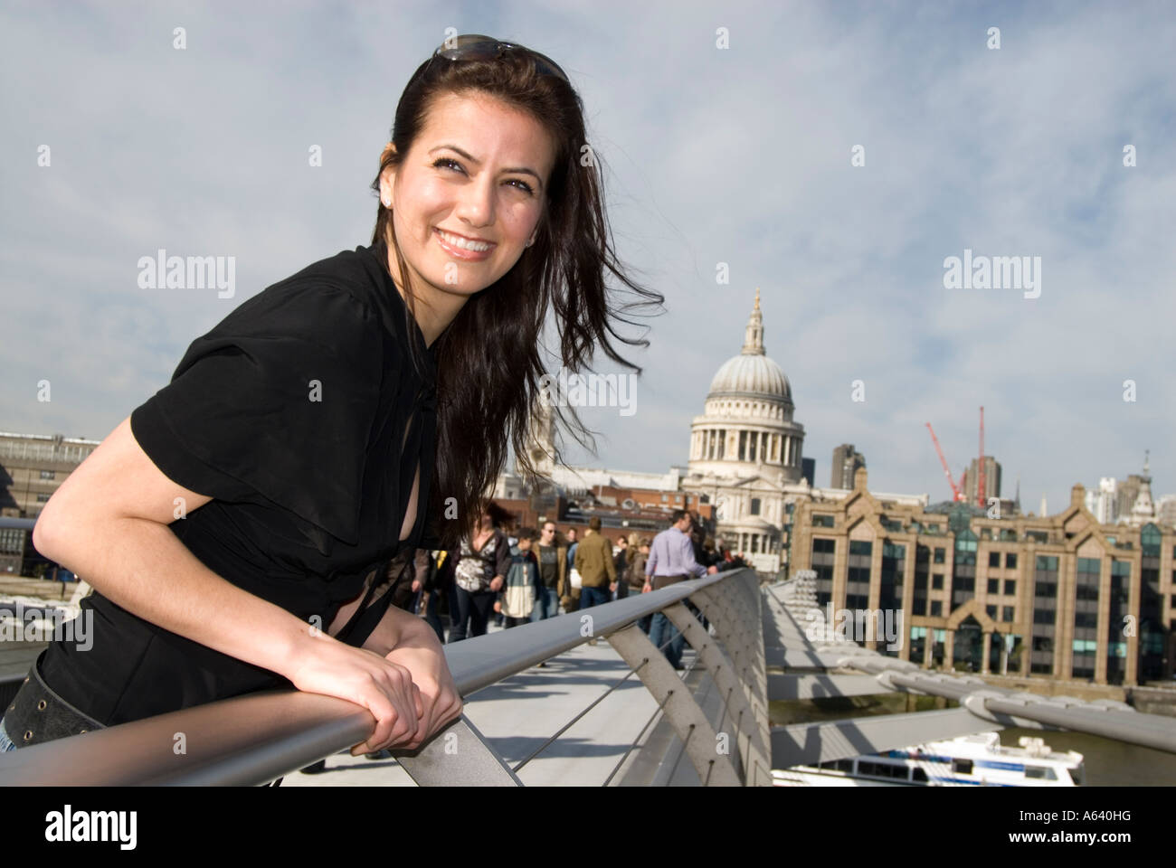 Woman on bridge london hi-res stock photography and images - Alamy