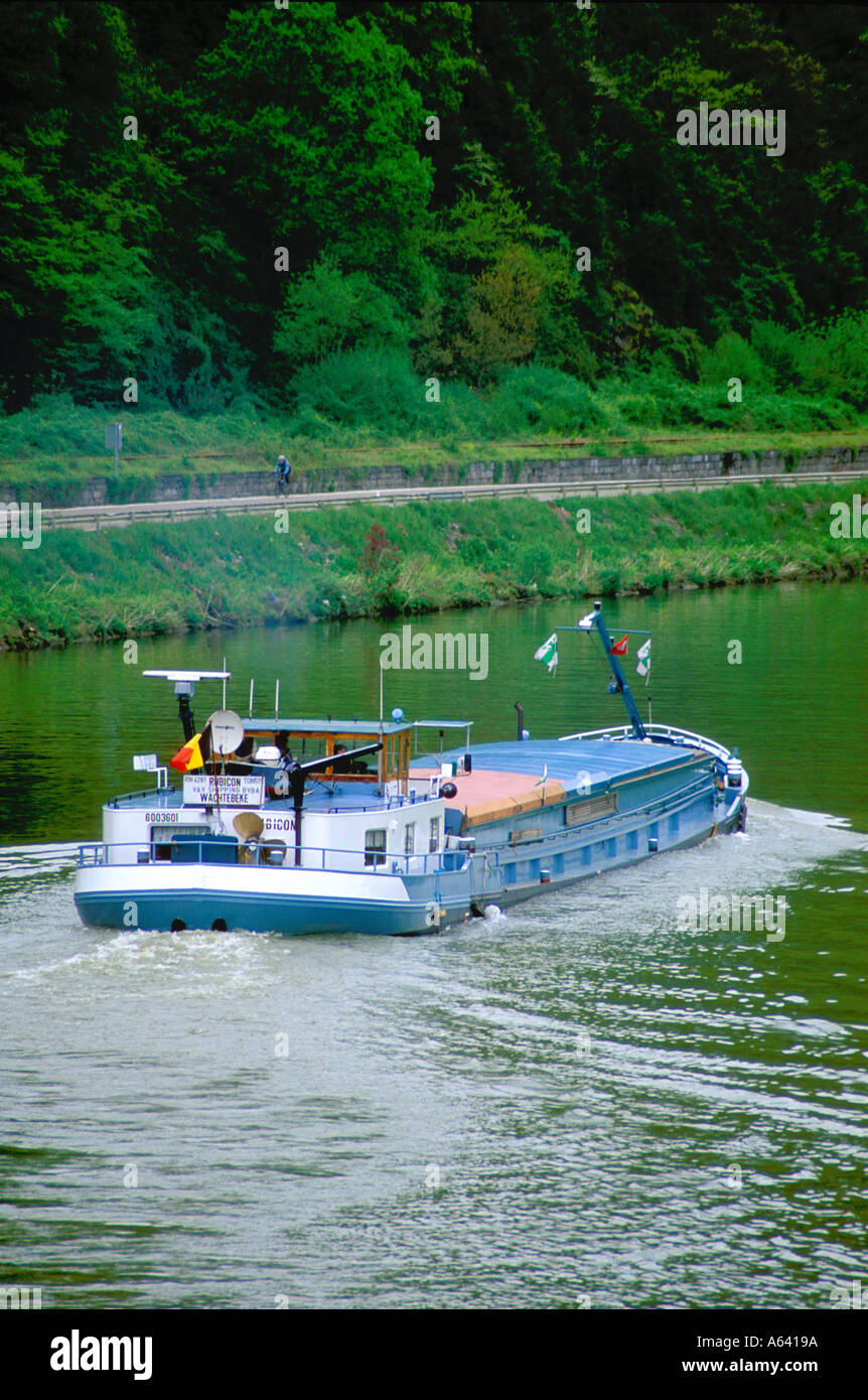 Cargo vessel navigating the river Meuse in Belgium Stock Photo - Alamy
