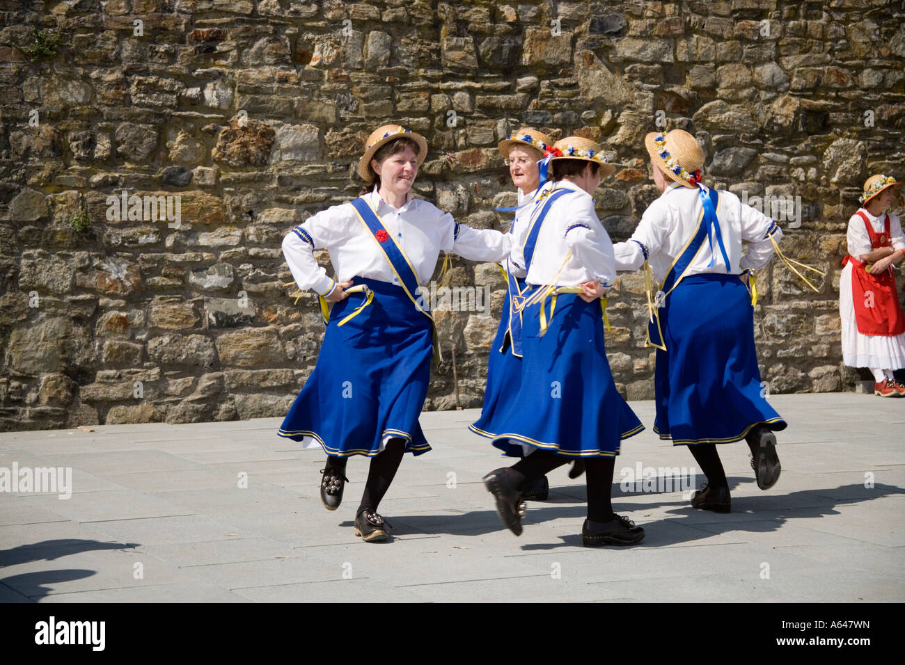 Morris dancers on the harbour front at Conway, North Wales, United ...