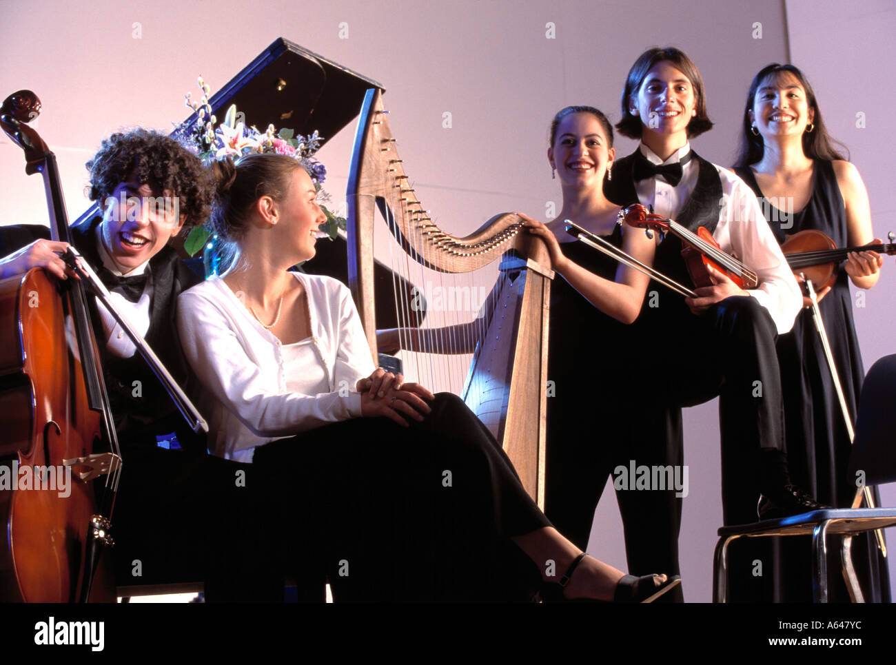 Five members of a teenage string ensemble Stock Photo - Alamy