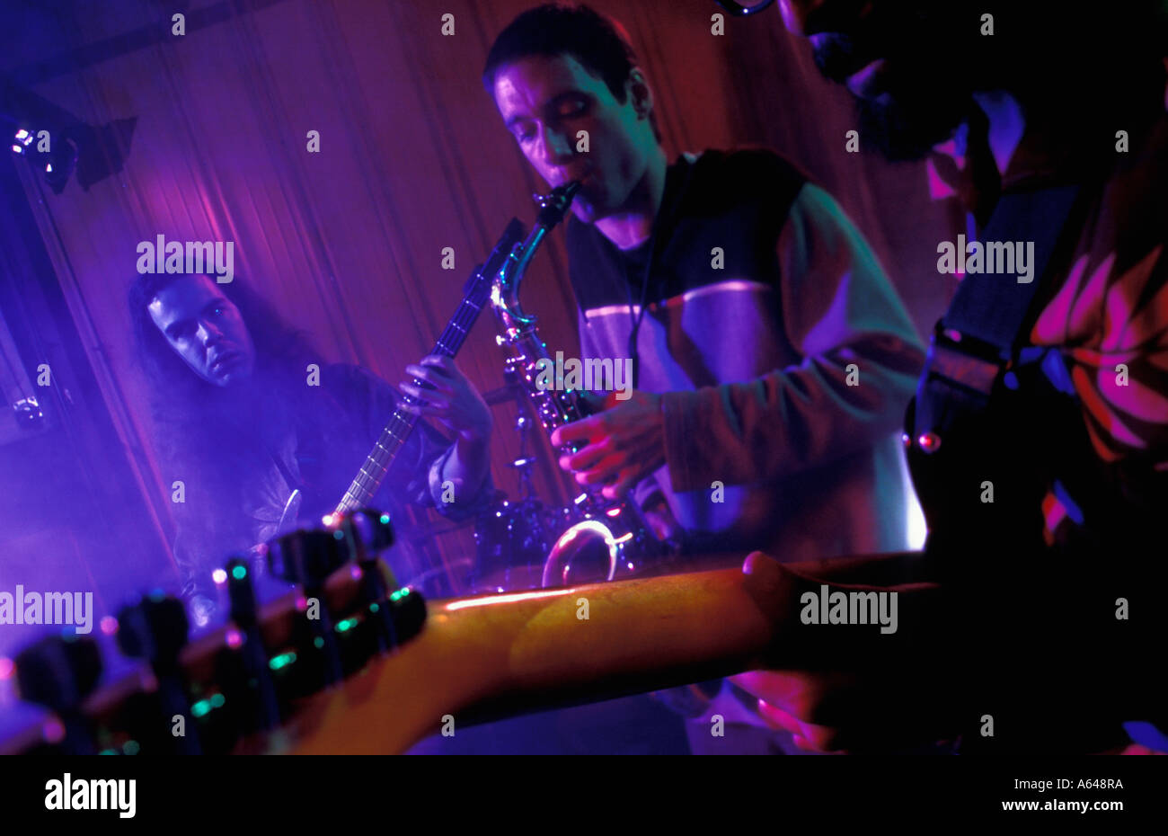 Jazz ensemble playing in night club Stock Photo - Alamy