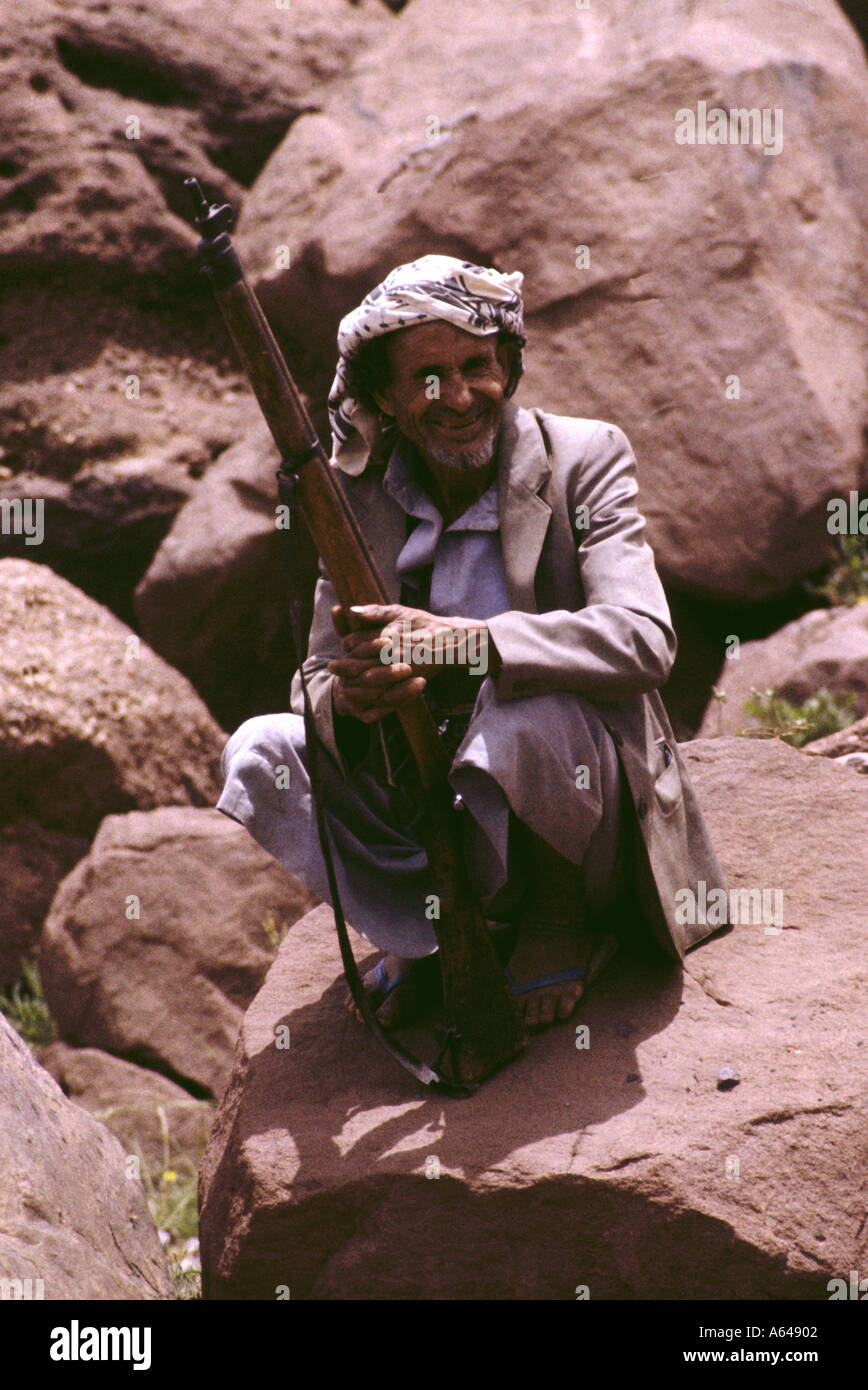jemen yemen man with a gun guard watchman guardian traditional sitting ...