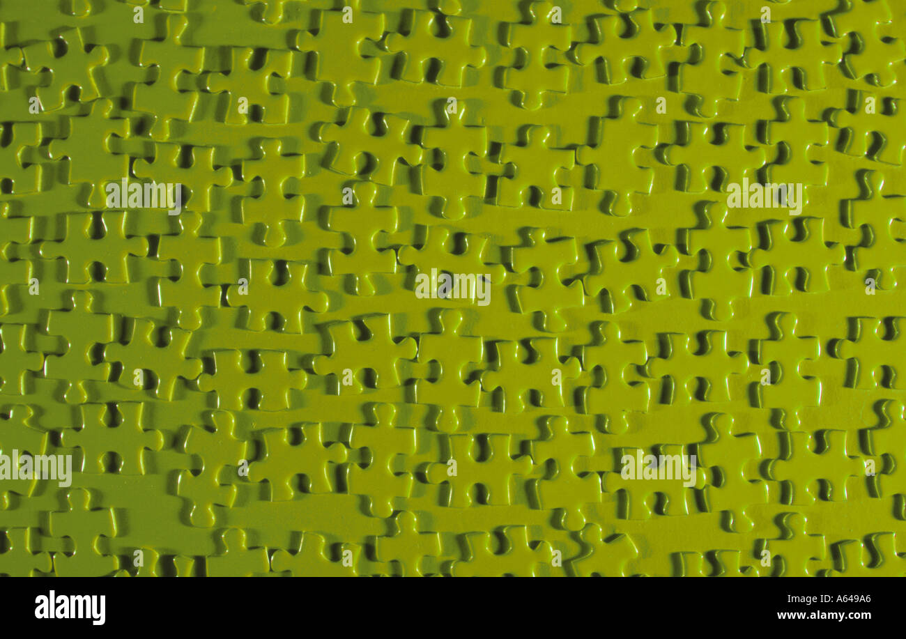 yellow green jigsaw puzzle pieces Stock Photo - Alamy