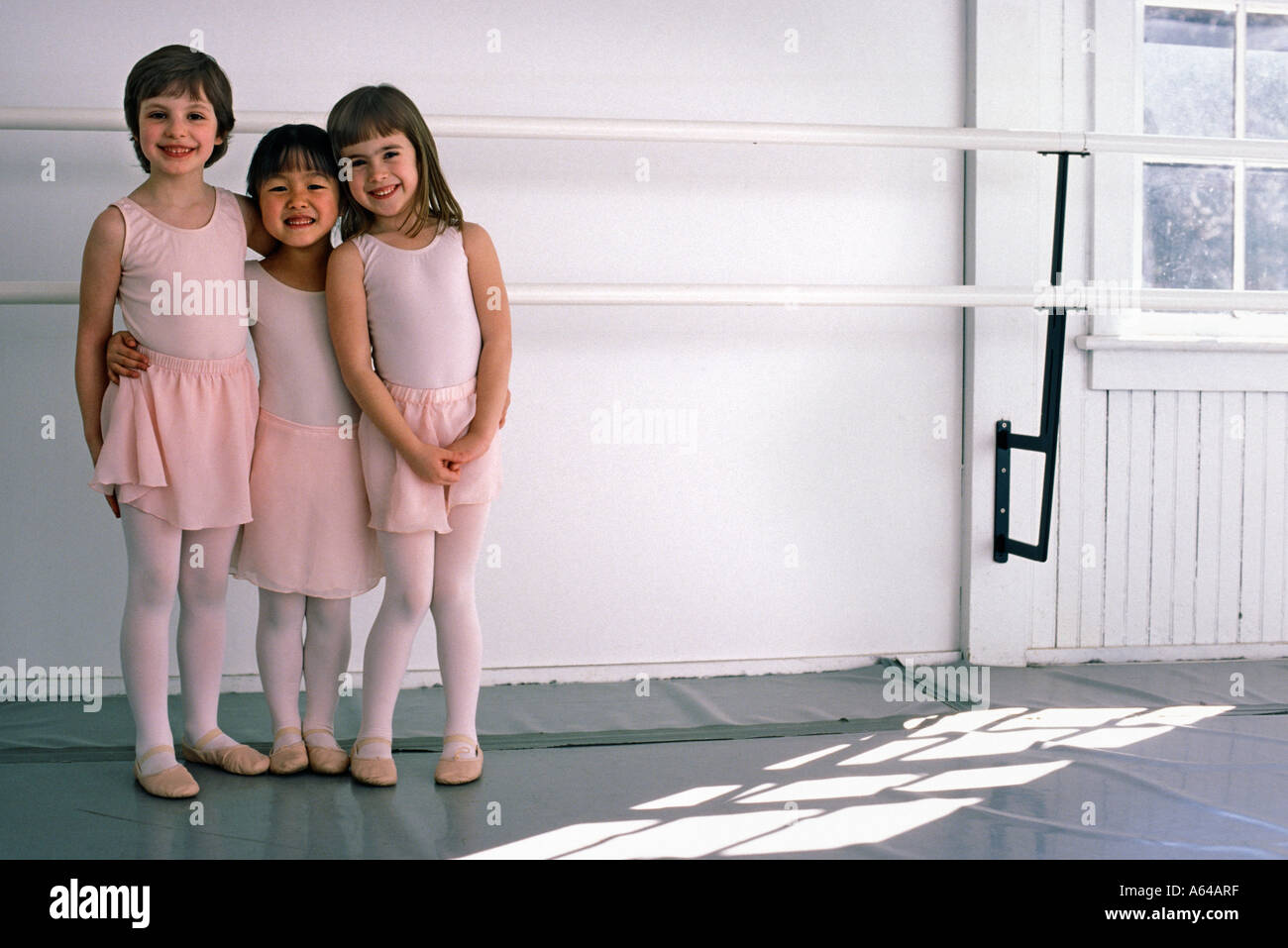 Three little dancers in ballet studio Stock Photo - Alamy