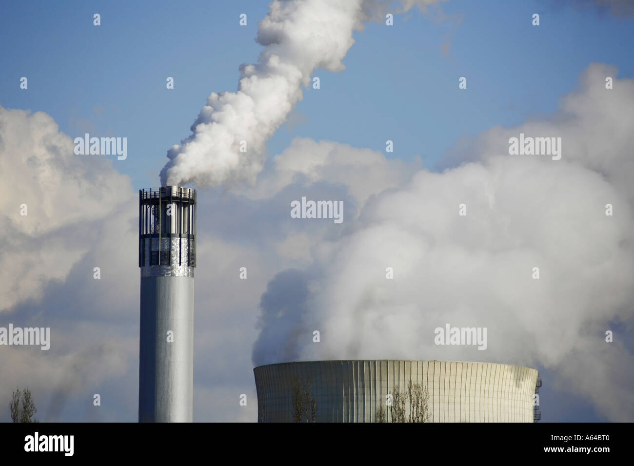 Chimney and cooling tower of a heating power station Stock Photo - Alamy