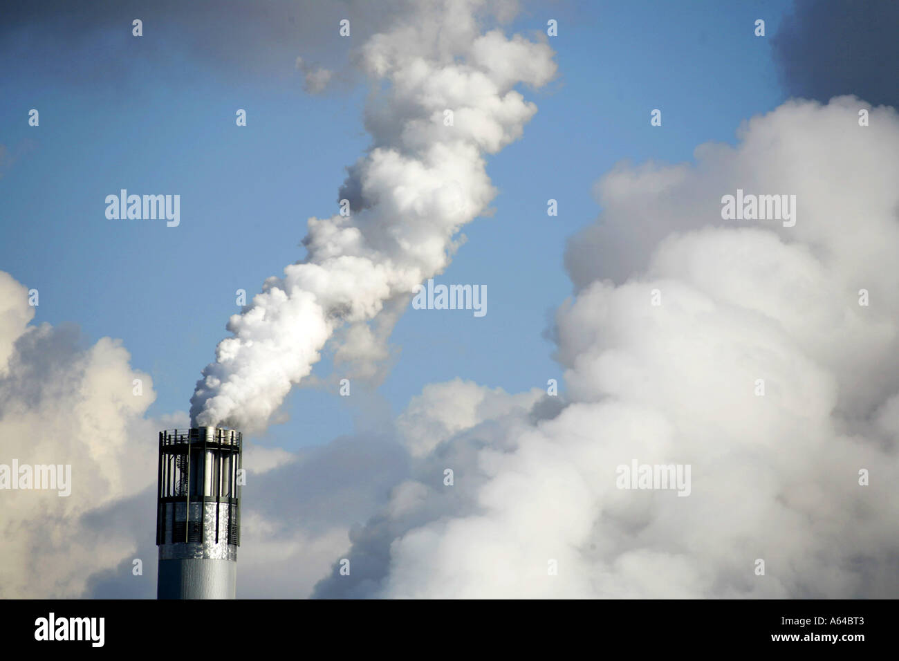 Chimneys with smoke column hi-res stock photography and images - Alamy