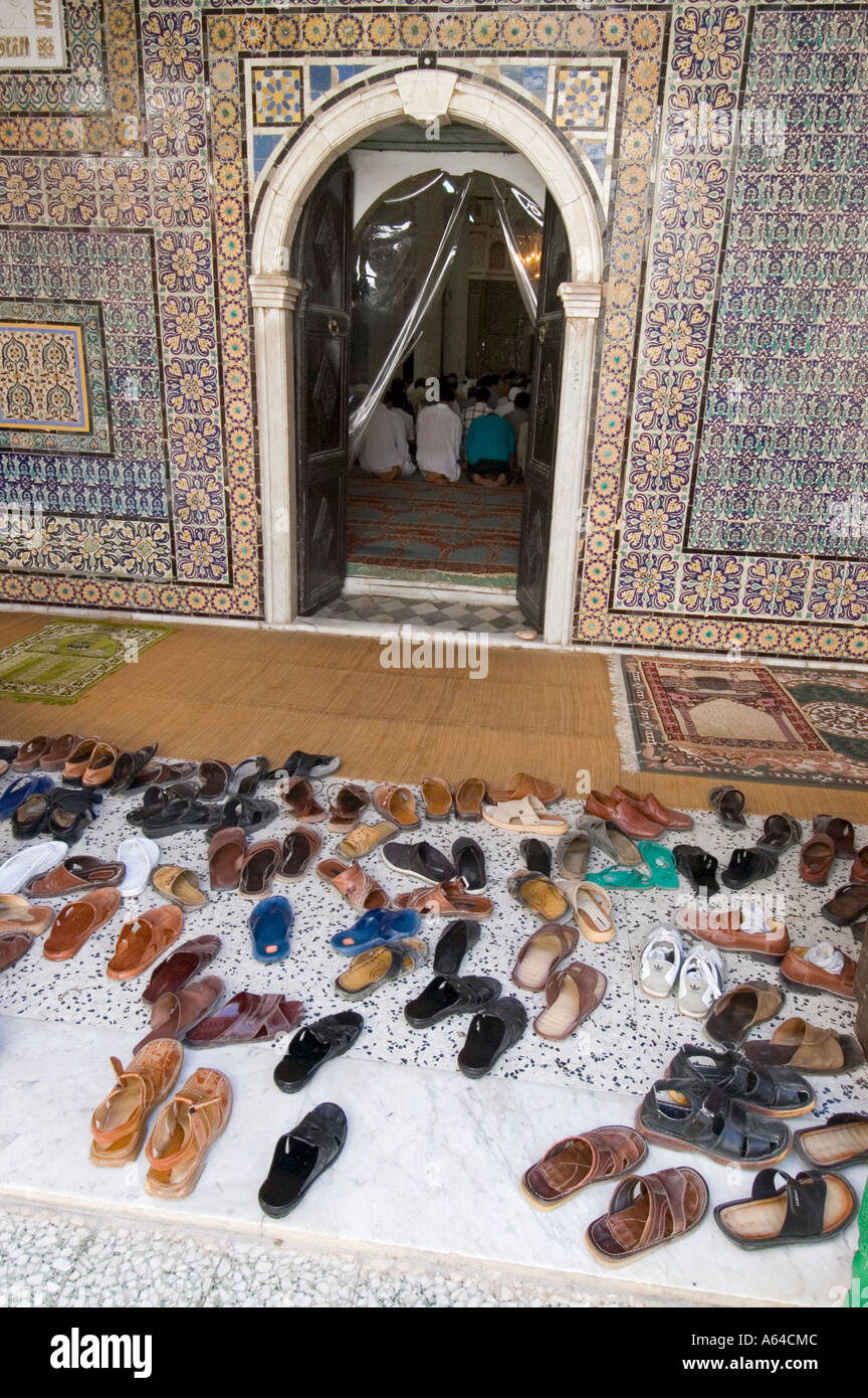 Shoes in front of mosque hi-res stock photography and images - Alamy