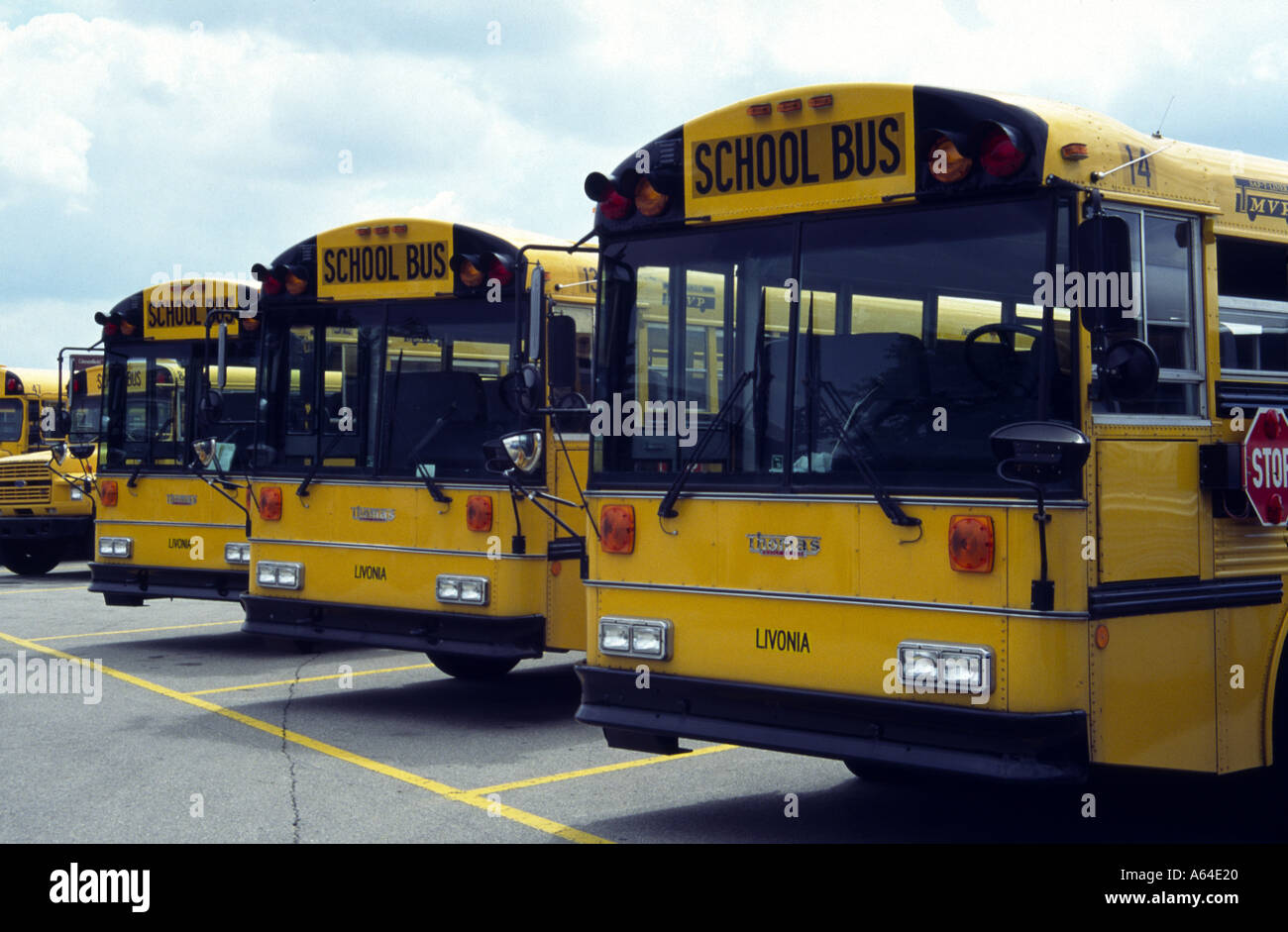 Line of parked American school busses Stock Photo - Alamy