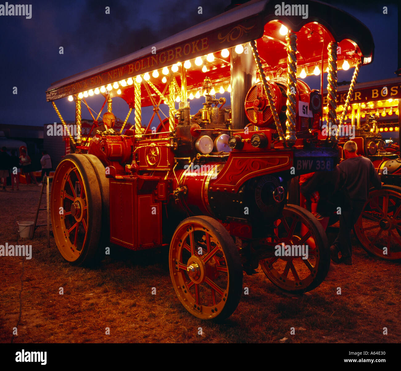 Illuminated steam powered tractor engine at the Great Dorset Steam Fair ...