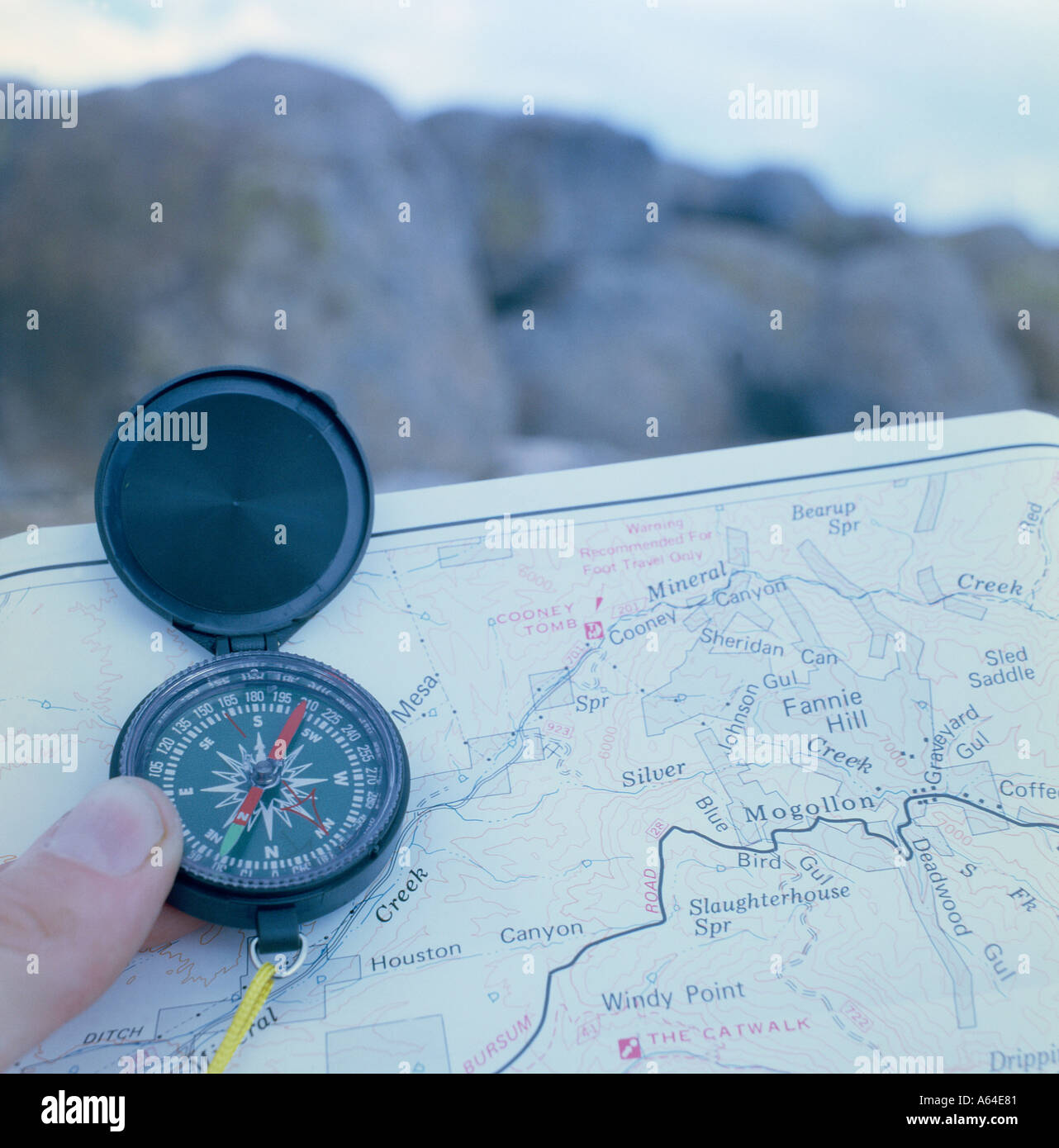 Close up of a map and compass Stock Photo - Alamy