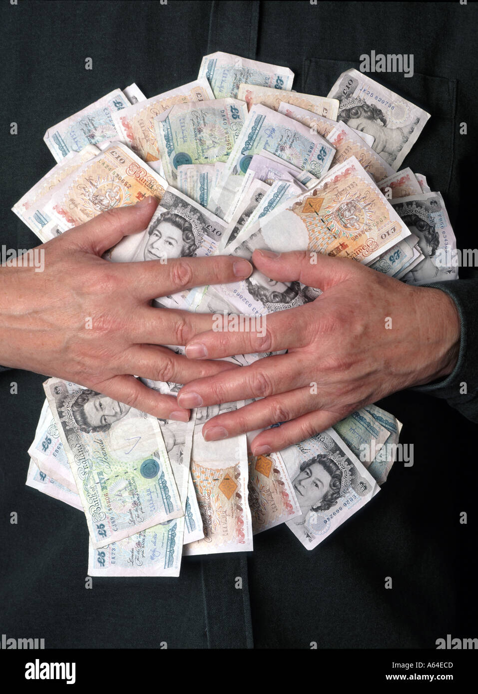 Banker UK money hands grasping wad cash pound sterling bank notes ...