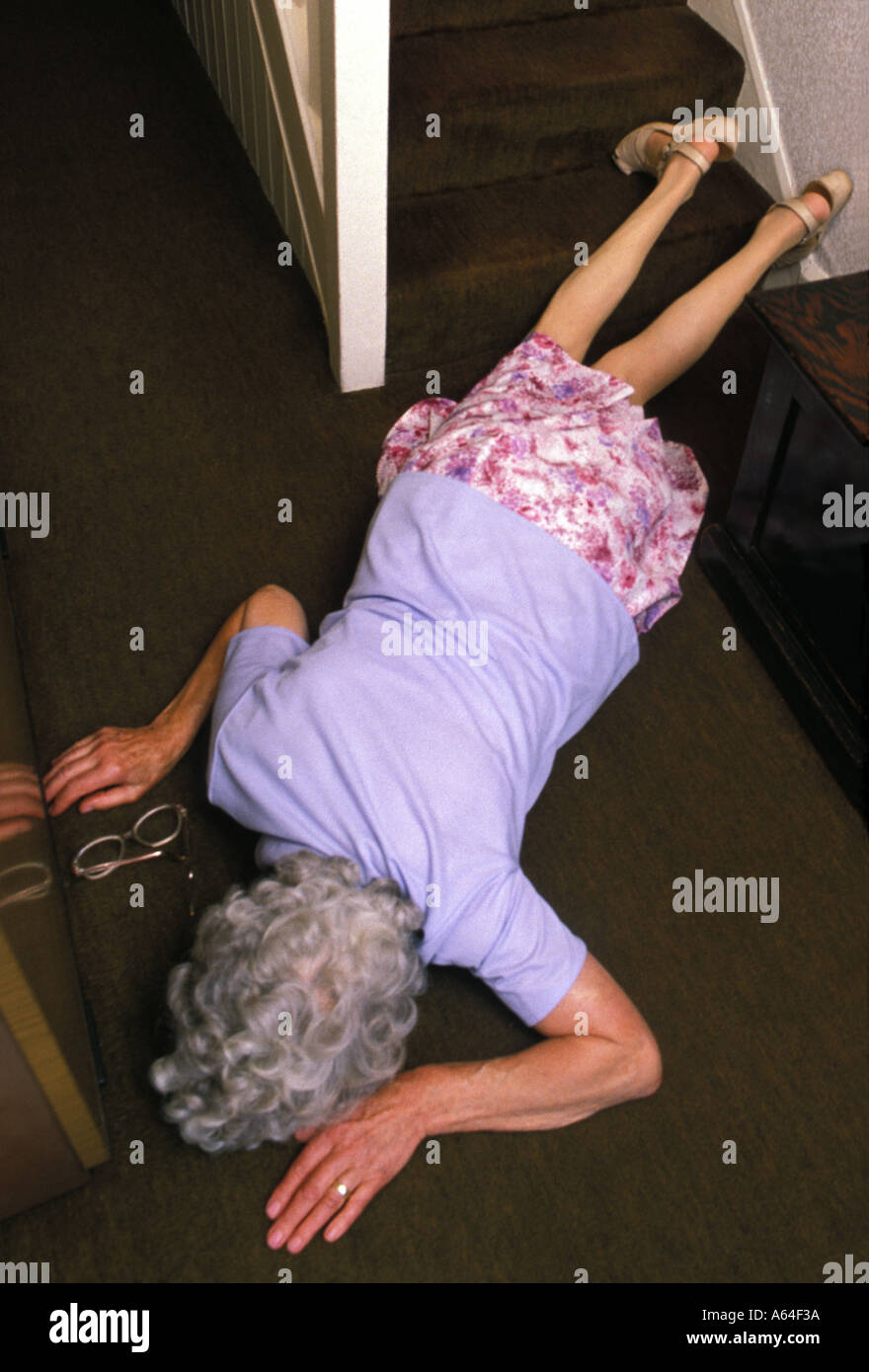 elderly woman fallen or pushed down stairs Stock Photo - Alamy