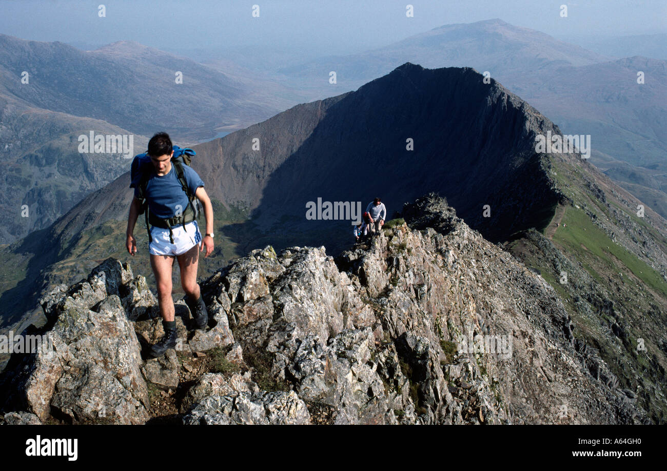 Walkers on Crib Goch ridge Mount Snowdon North Wales United Kingdom of ...