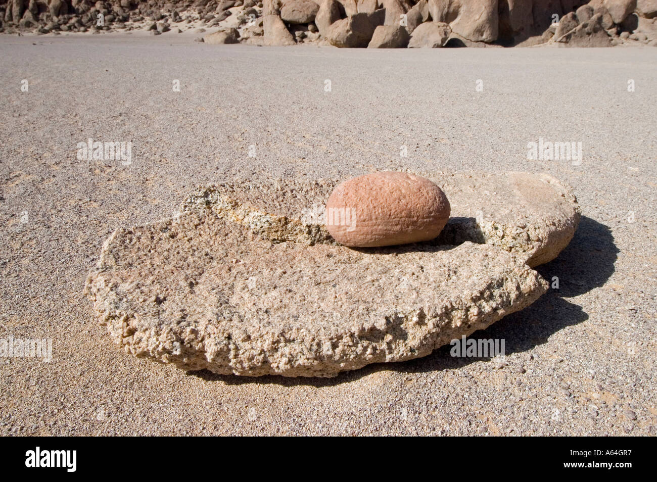 Old grinding stone for grain at Jebel Uweinat, Jabal al Awaynat Stock ...
