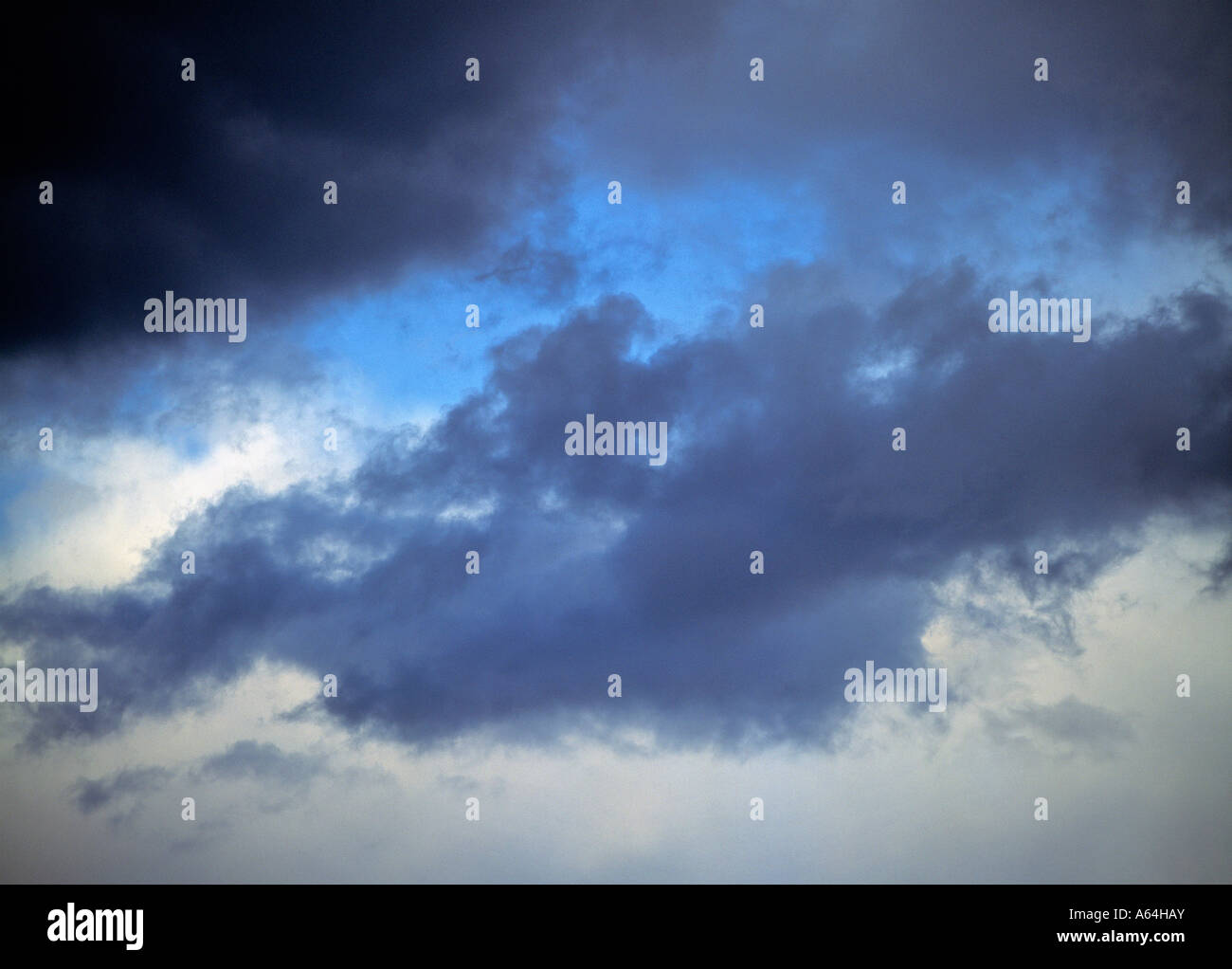 clouds after heavy snowwind Stock Photo - Alamy