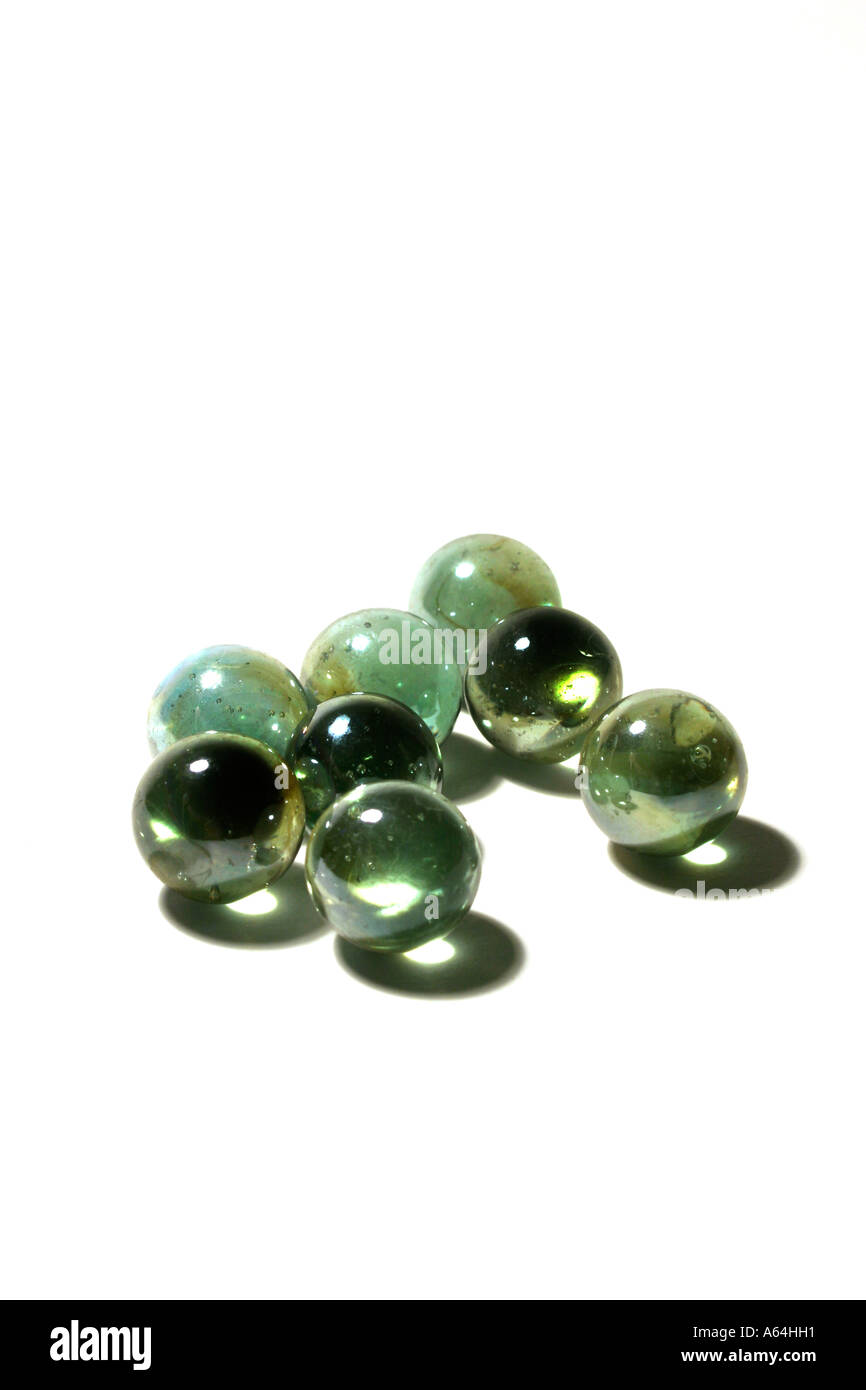Glass marbles on a white background Stock Photo - Alamy
