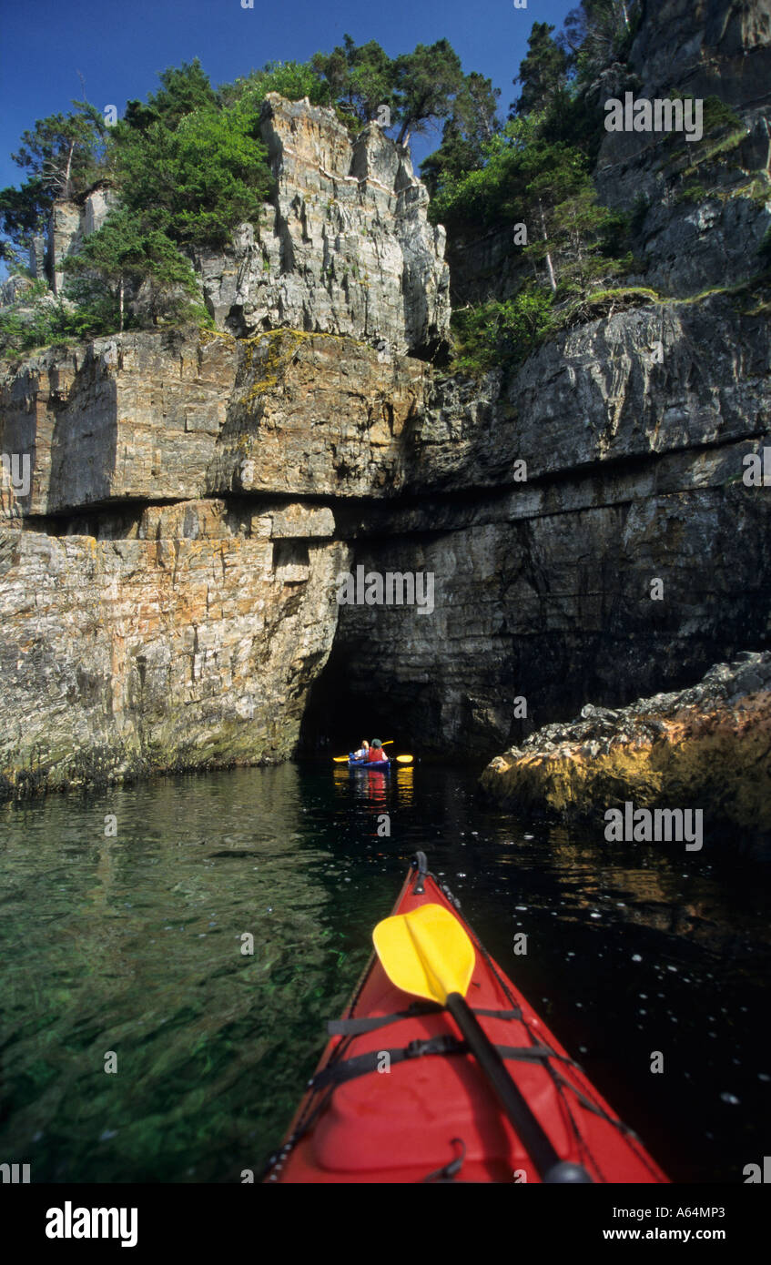 Seakajak in front of cliffs near Bay Bulls, Avalon Peninsula ...