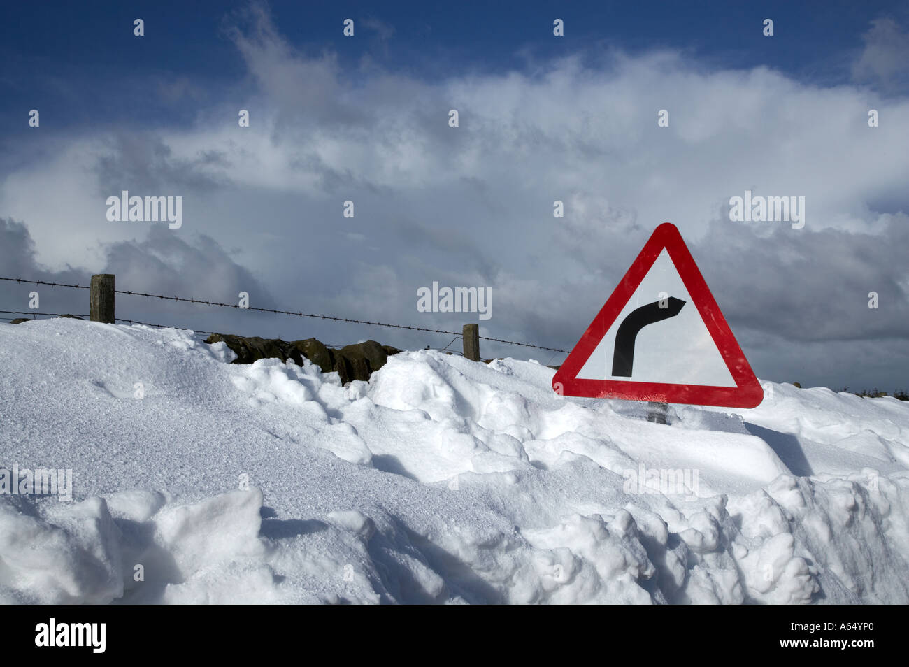 Road sign in snow drift North Yorkshire Stock Photo - Alamy