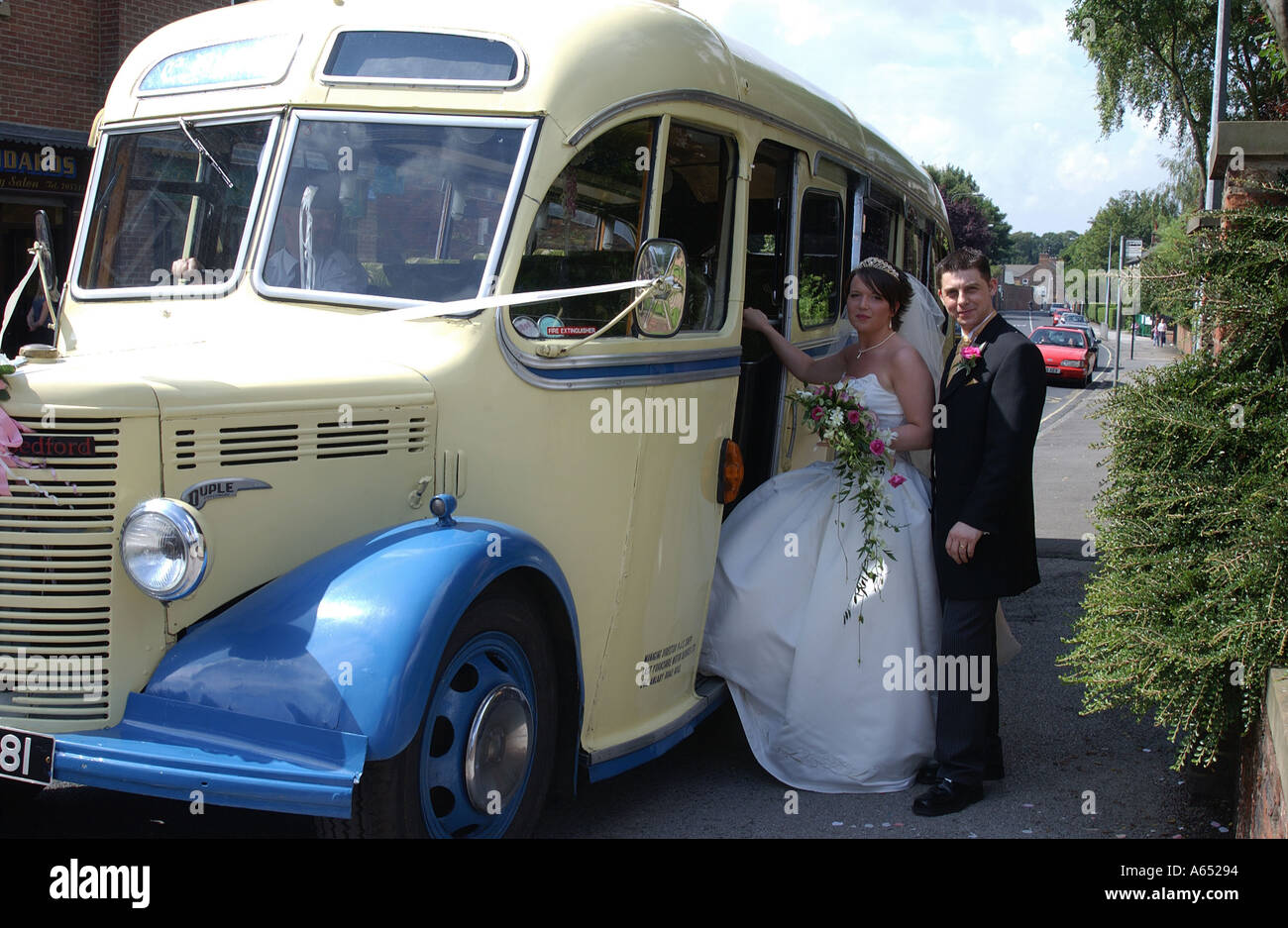 bride and groom getting on old bus on wedding day Stock Photo - Alamy