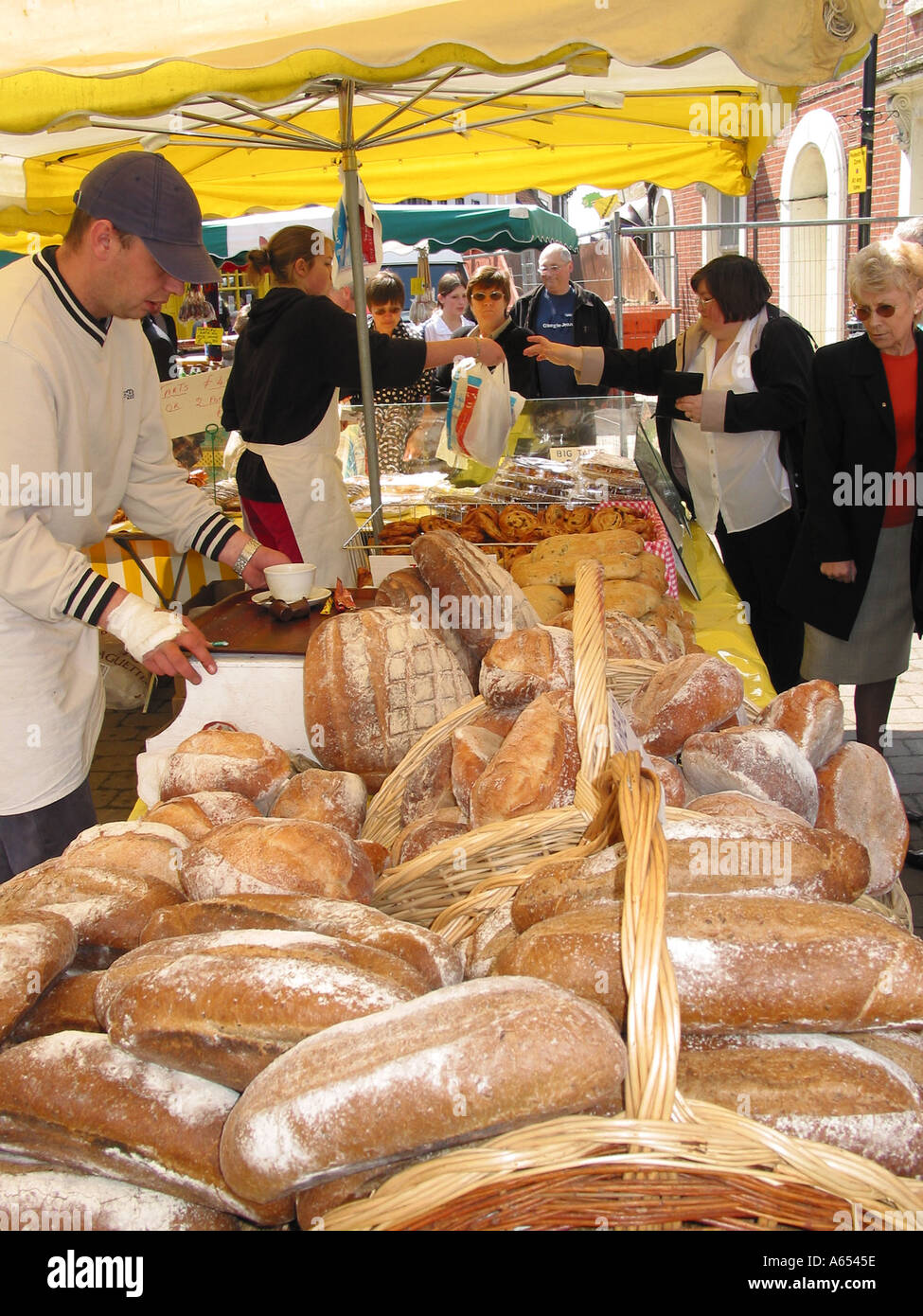 French Bakery, buying French bread, French boulangerie stall, French ...