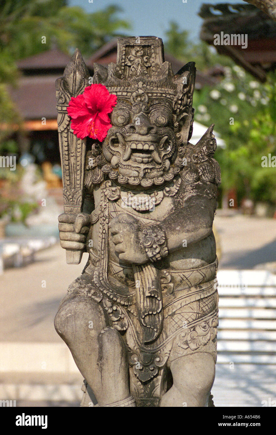 Stone statue outside the gate of are resort hotel Bali Indonesia Stock ...