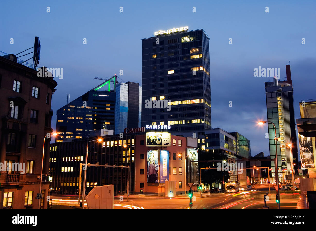 Modern City Center Buildings and Skyscrapers lit up at night Stock ...