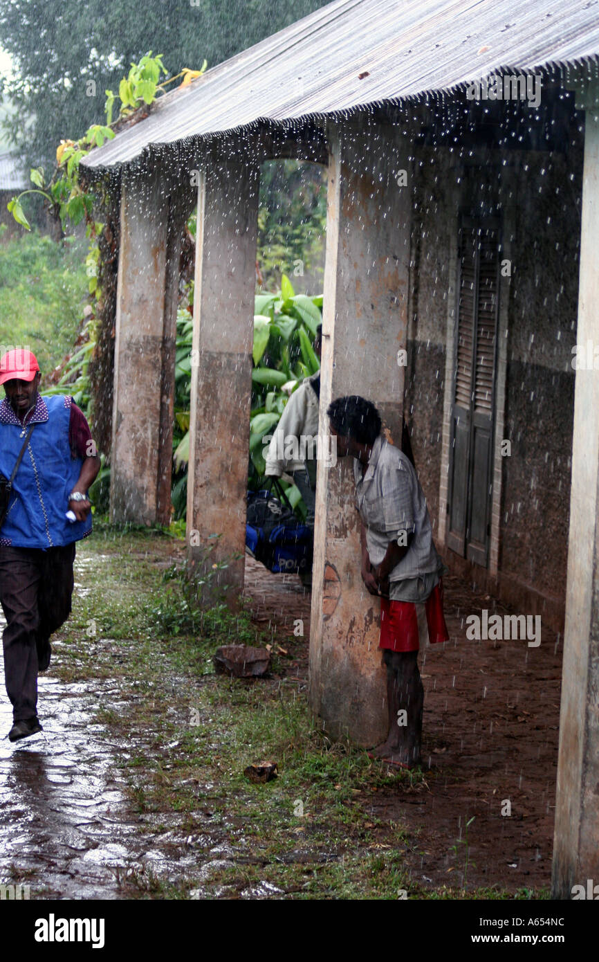 Local people line the rail when the famous FCE railroad train passes ...