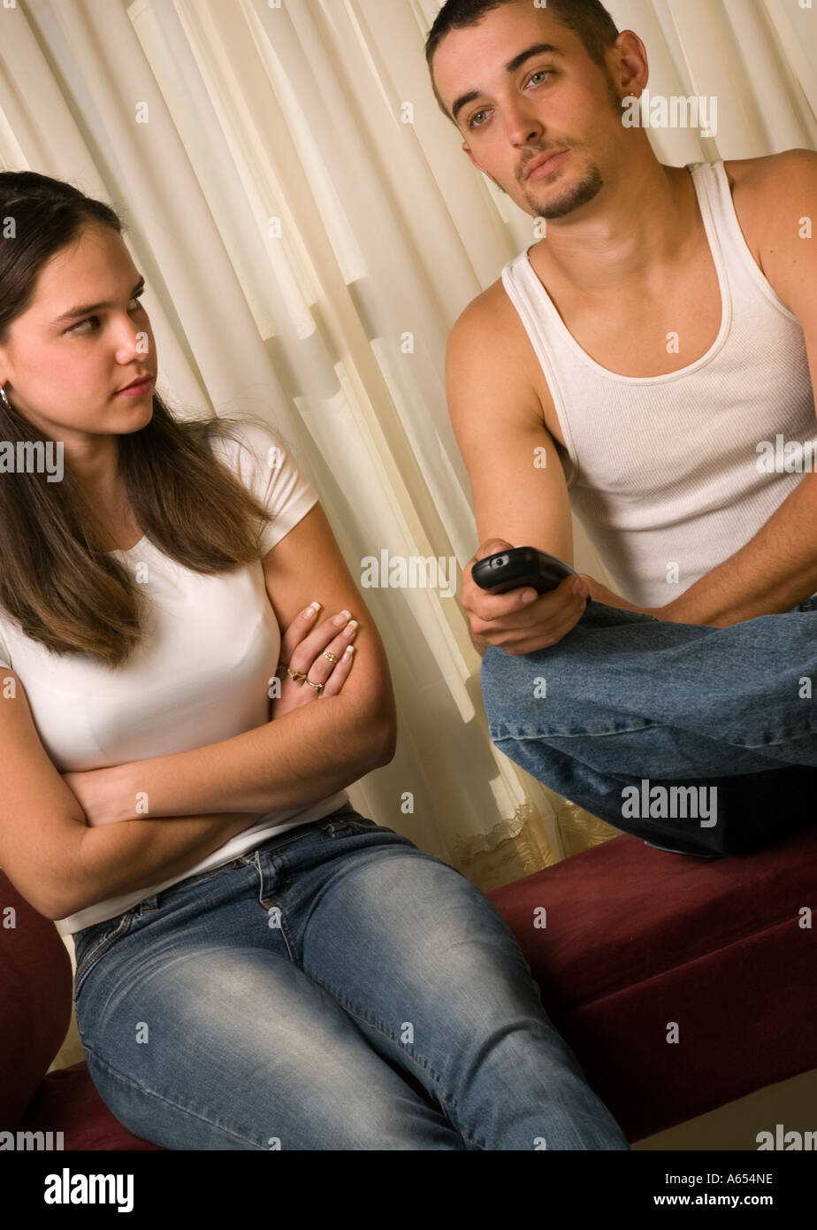 Young Caucasian Couple 20 to 25 Arguing Over TV Remote Control USA ...