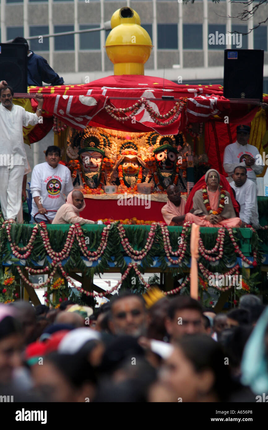 Wax figure and idols on a float in a Hari Krishna Parade being pulled ...
