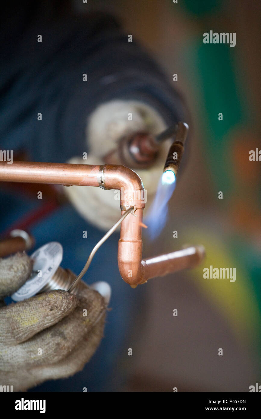 Soldering copper pipe hi-res stock photography and images - Alamy