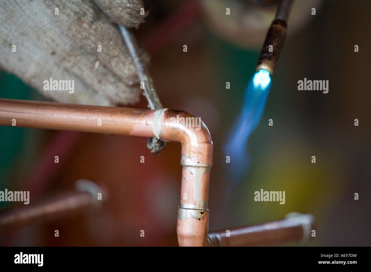 Soldering copper pipe hi-res stock photography and images - Alamy