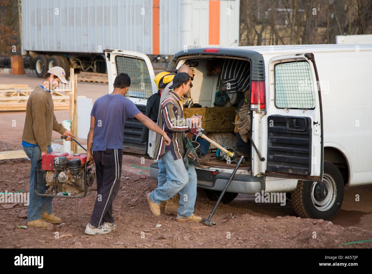 Immigrant Construction Worker Finishing Work Stock Photo - Alamy
